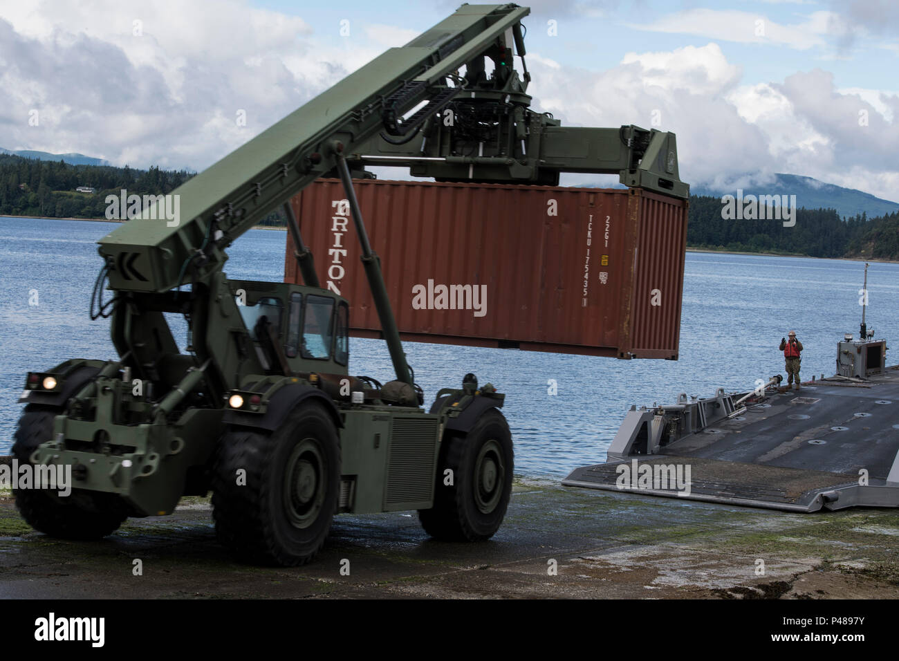 U.S. Navy sailors assigned to Amphibious Construction Battalion One ...