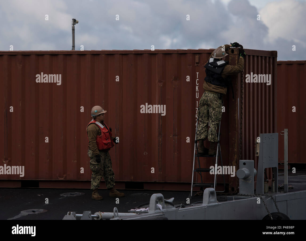 U.S. Navy sailors assigned to Amphibious Construction Battalion One ...
