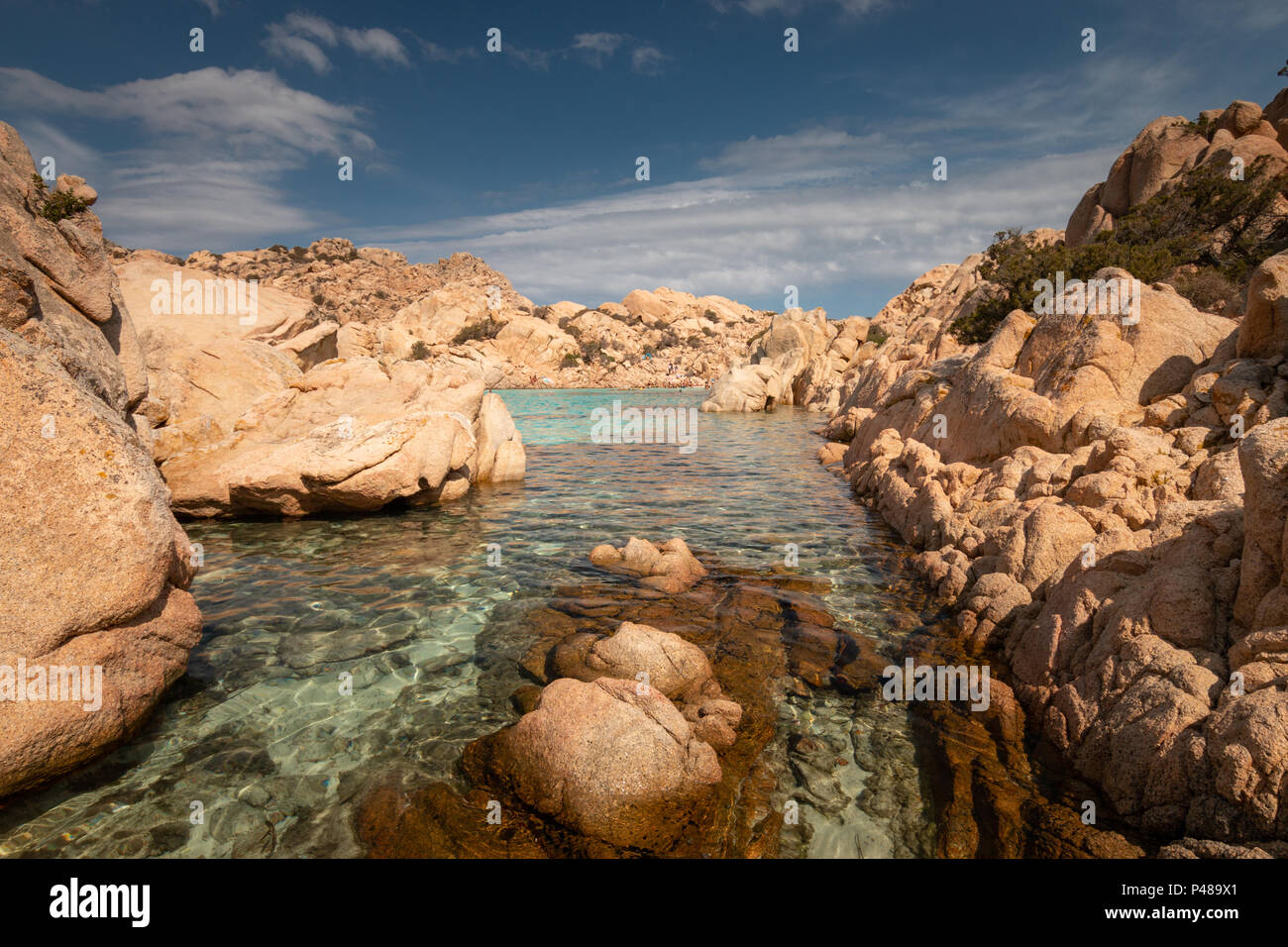 Beach life at Spiaggia Cala Coticcio on the Italian island of Caprera ...