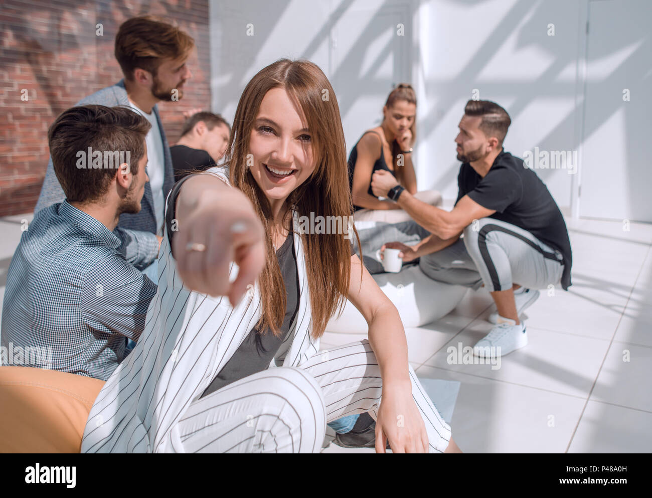 modern young woman pointing at you Stock Photo - Alamy