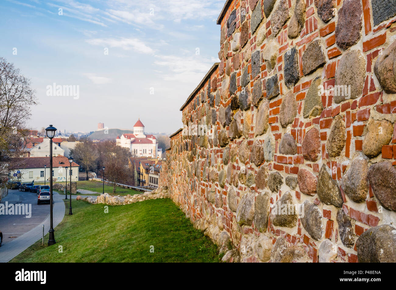 Old wall of Vilnius Old Town and Church of the Holy Mother of God in ...