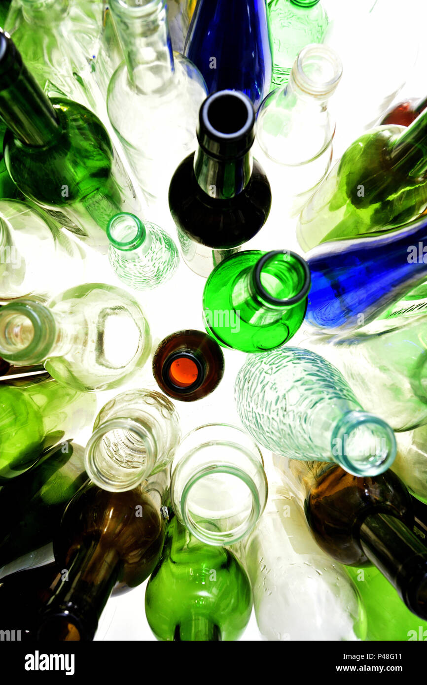 top view of glass bottles on white Stock Photo - Alamy