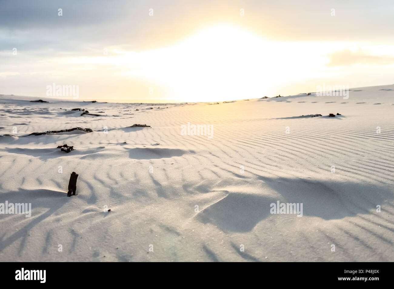Coastal white beach sand with ripples and waves texture pattern for ...