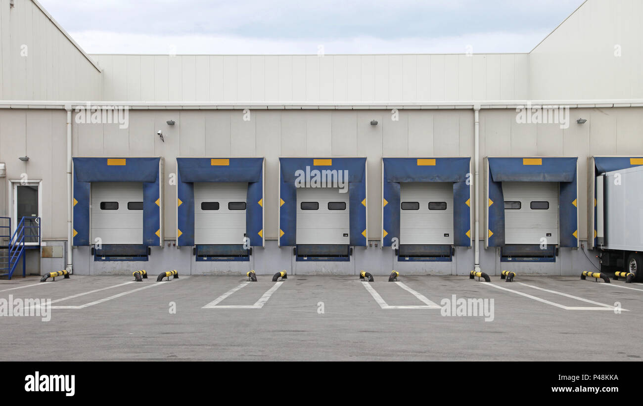 Loading Ramp Cargo Doors at Distribution Center Warehouse Stock Photo ...