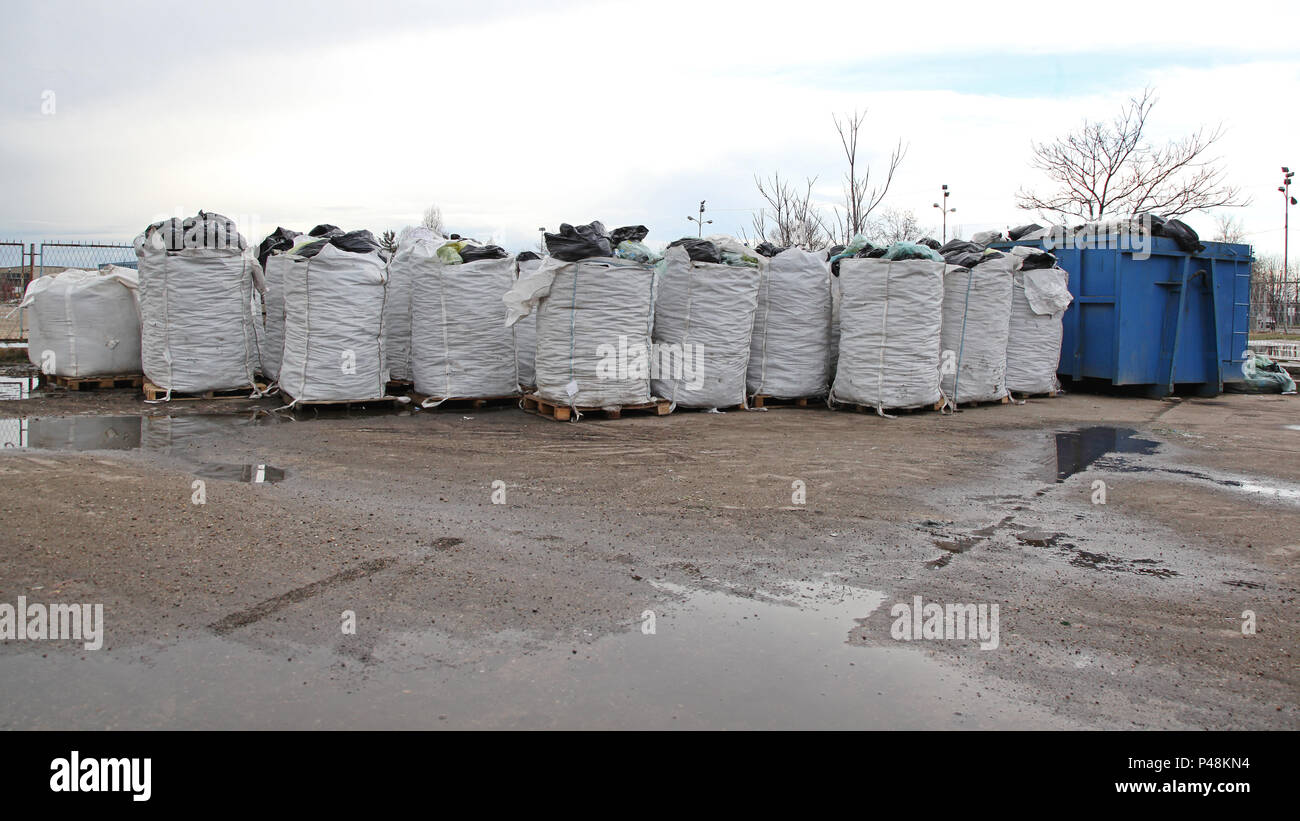 Big Sack Bags and Dumpster Sorted Material for Recycling Stock Photo ...
