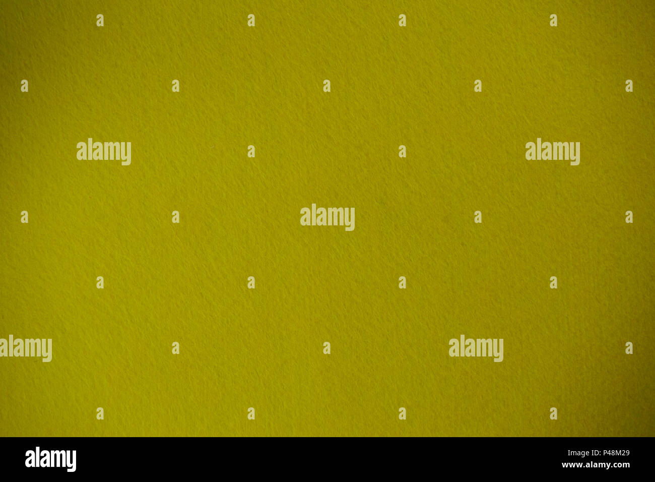 Dark yellow felt texture background Stock Photo - Alamy