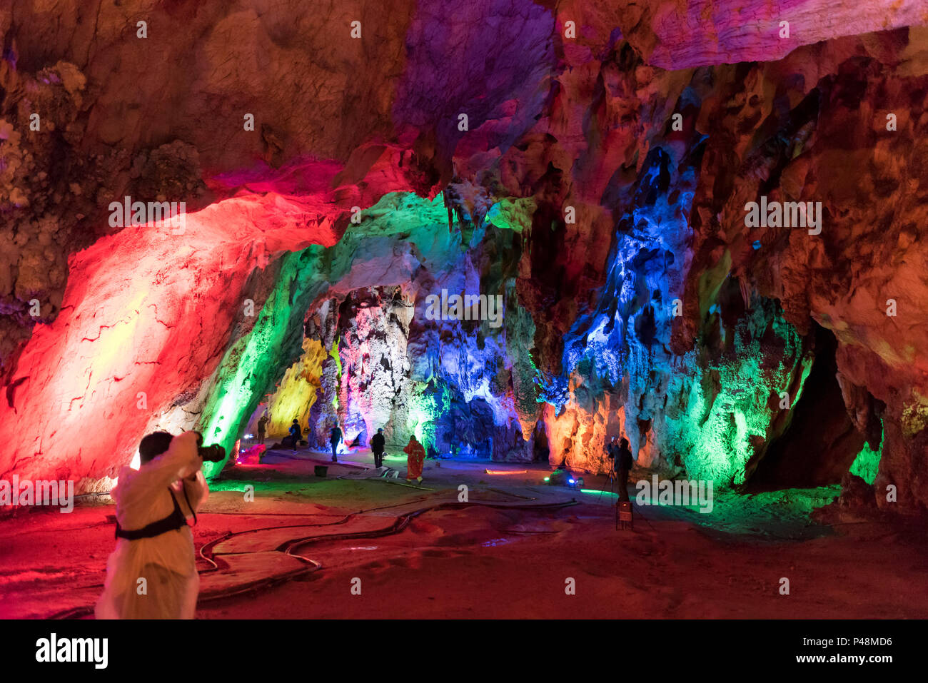 Brightly lit interior of underground cave, Tian Zhong Cave, Libo ...