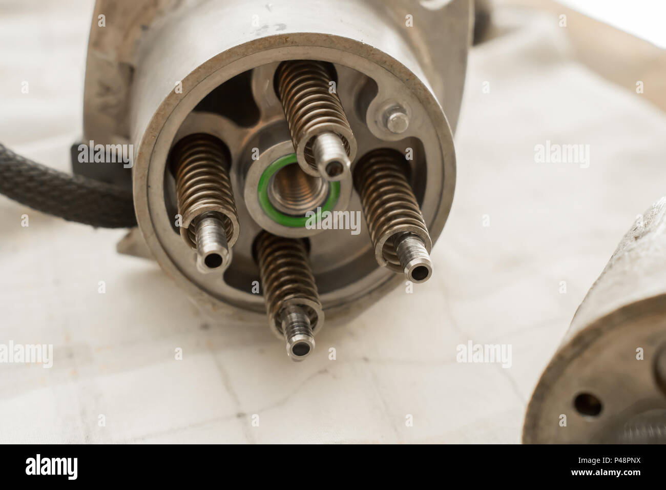 Repair and parts of a compact loader Stock Photo - Alamy