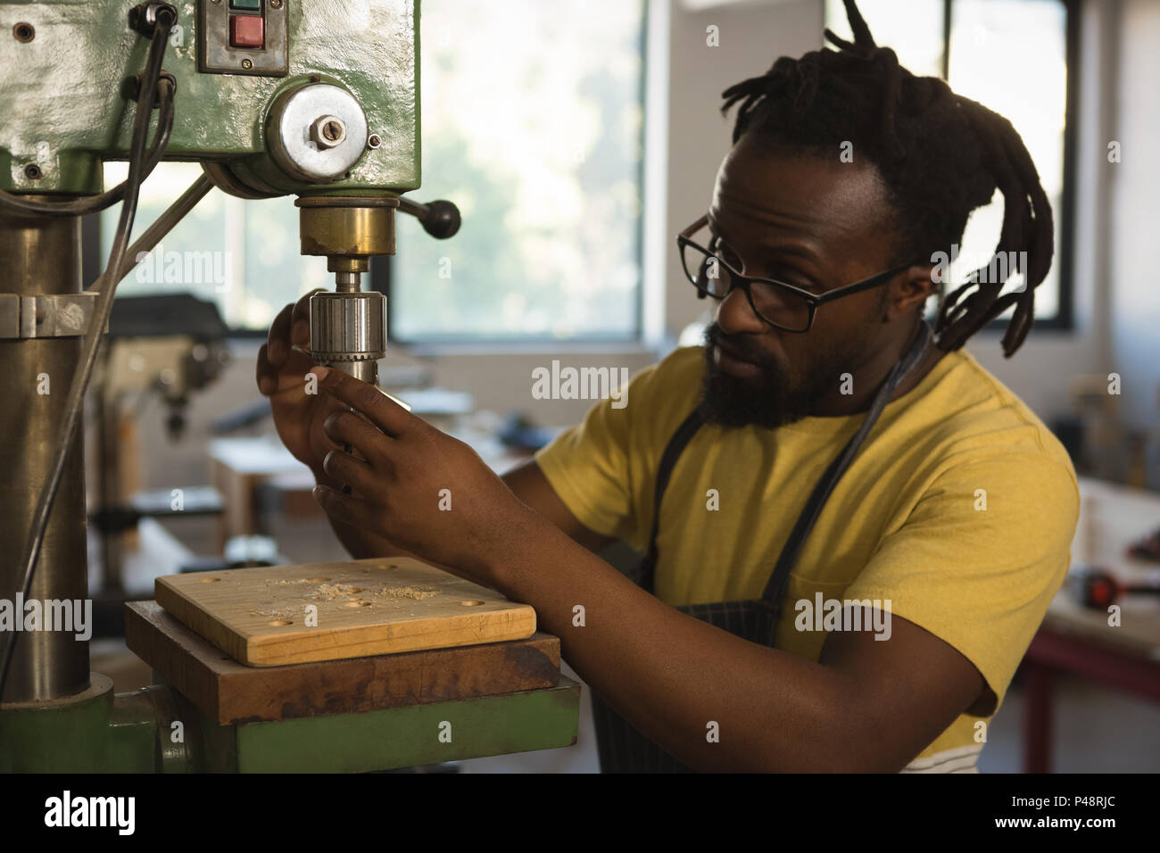 Craftsman carpenter drilling machine tool hi-res stock photography and ...