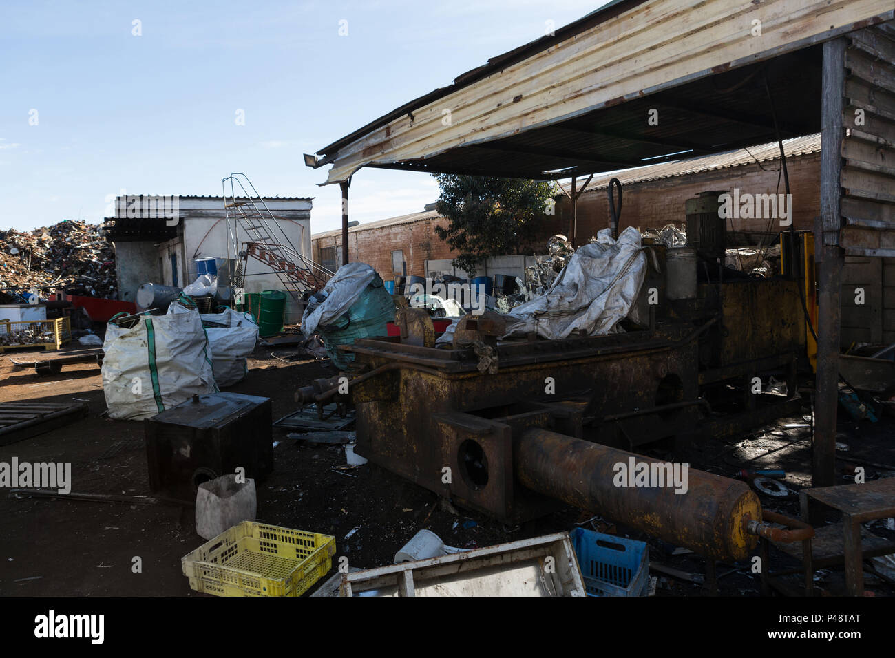 Compressed trash in scrapyard Stock Photo - Alamy