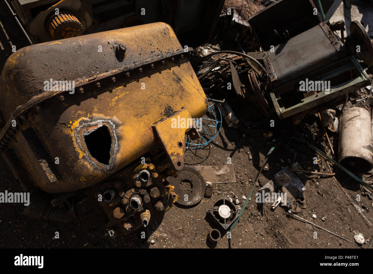 Destroyed machine part in the scrapyard Stock Photo - Alamy