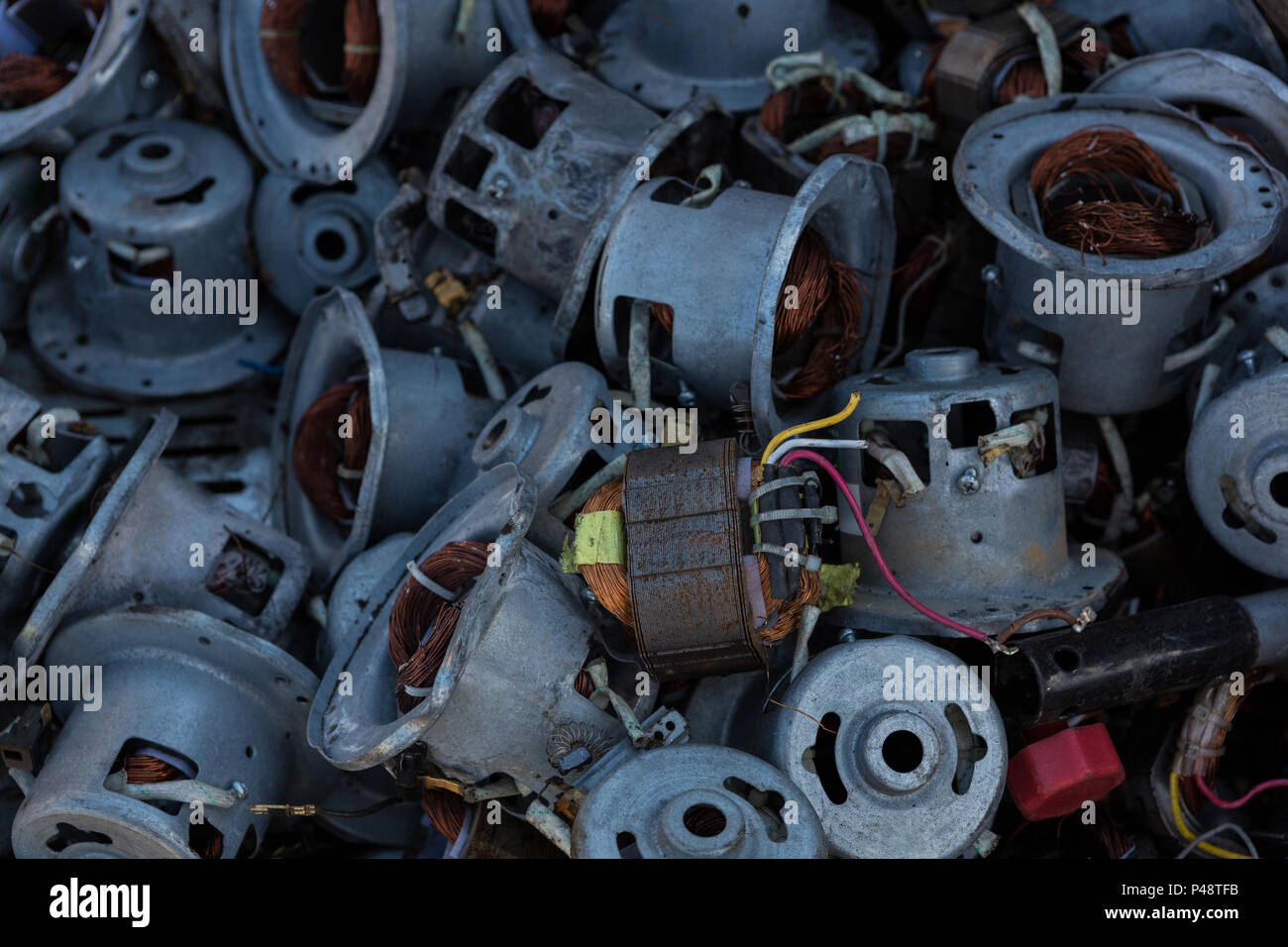 Machine parts in the junkyard Stock Photo - Alamy