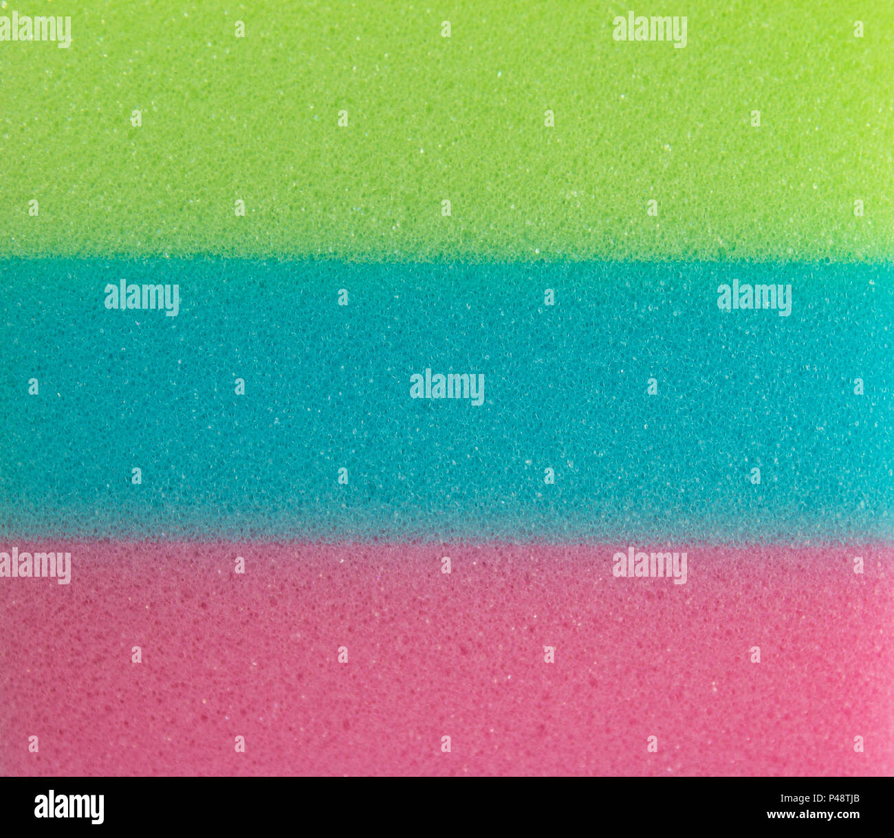 Three colour Sponge stacking Stock Photo - Alamy