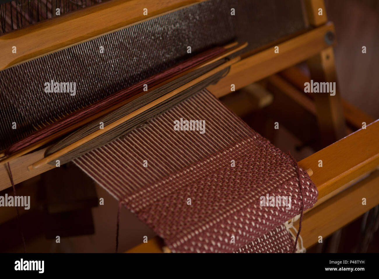 Machine with silk thread in factory Stock Photo - Alamy
