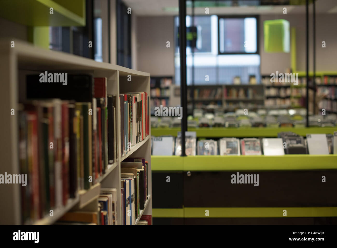 Books in book shelf in library Stock Photo - Alamy