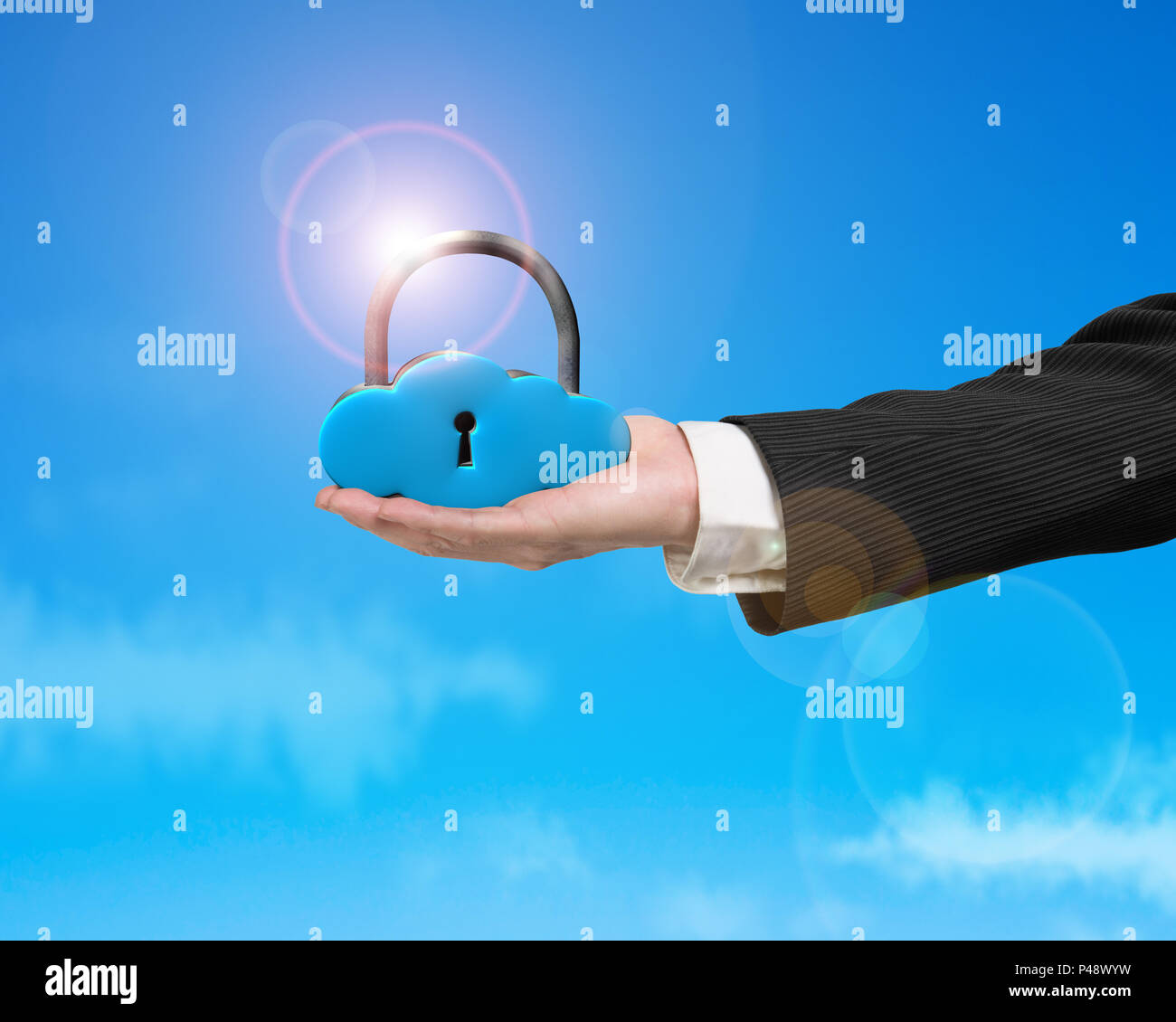 Cloud shape locker on hand with sunlight and blue sky Stock Photo - Alamy