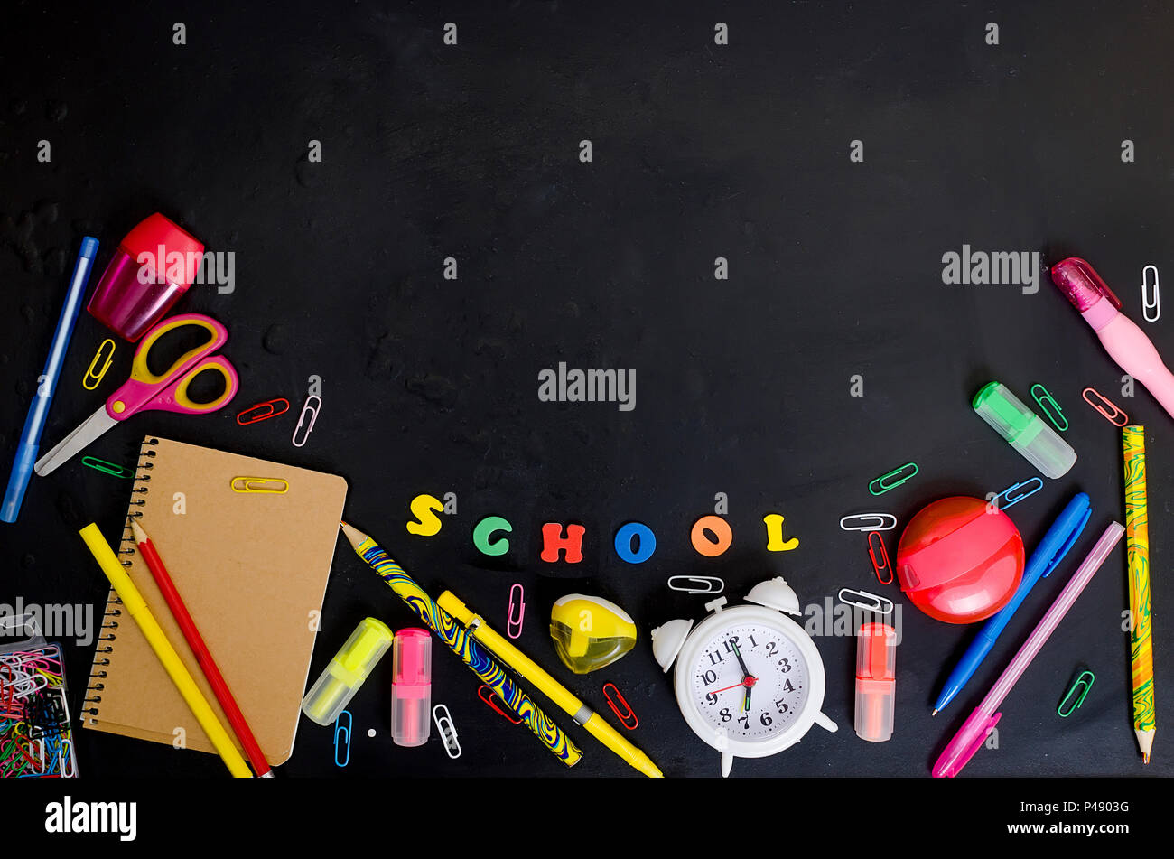 Flat lay with lettering back to school and set of school equipment on ...