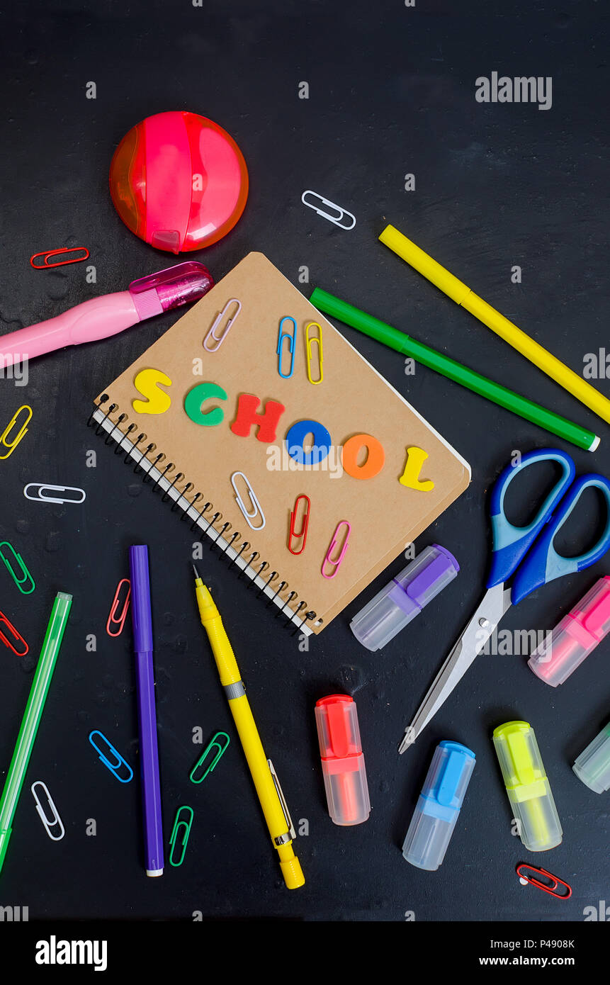 Flat lay with lettering back to school and set of school equipment on ...