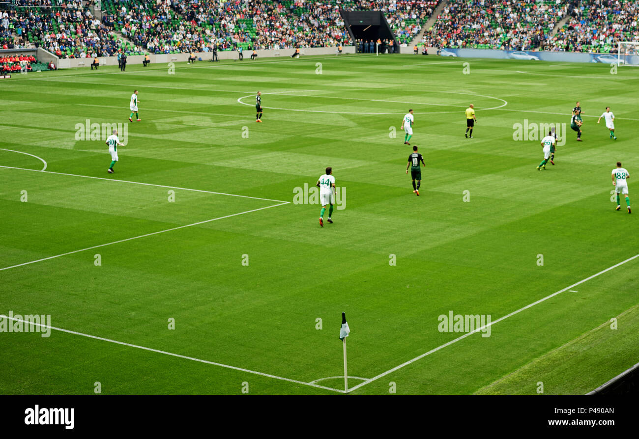 teams play football on the field Stock Photo - Alamy