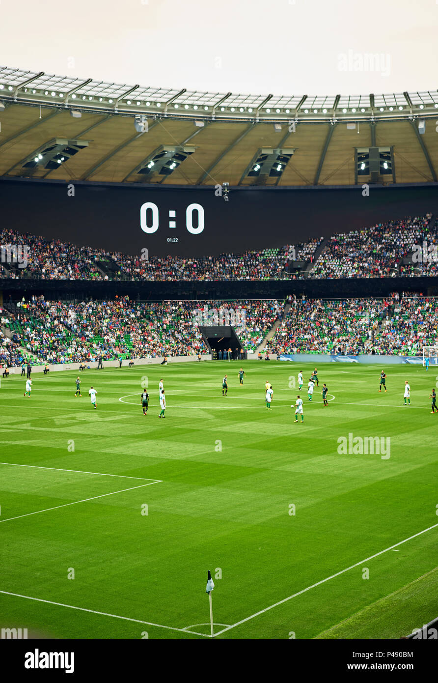 teams play football on the field Stock Photo - Alamy