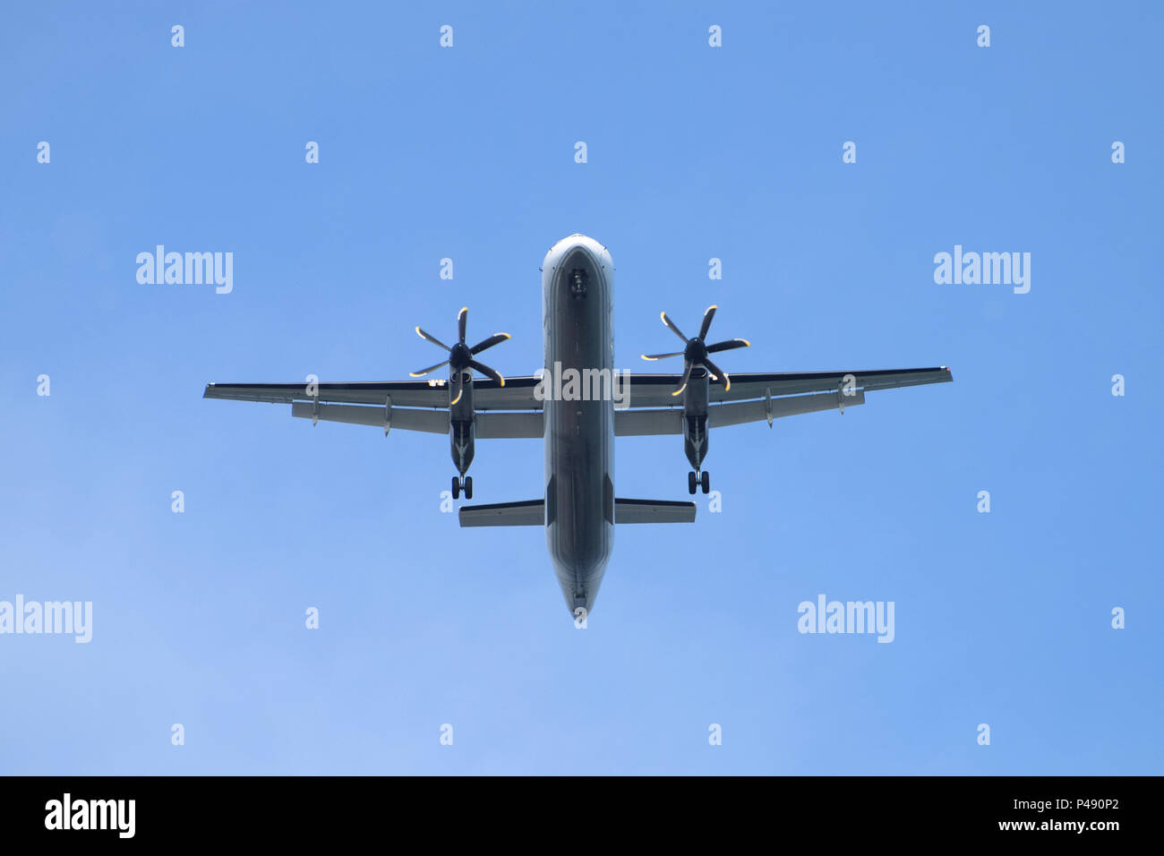 An airplane before landing Stock Photo - Alamy