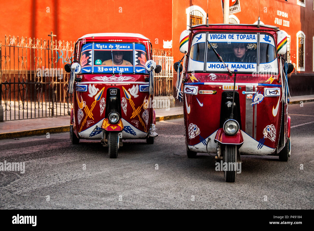 Tuk tuks on the street, a typical Peruvian public transport vehicle ...
