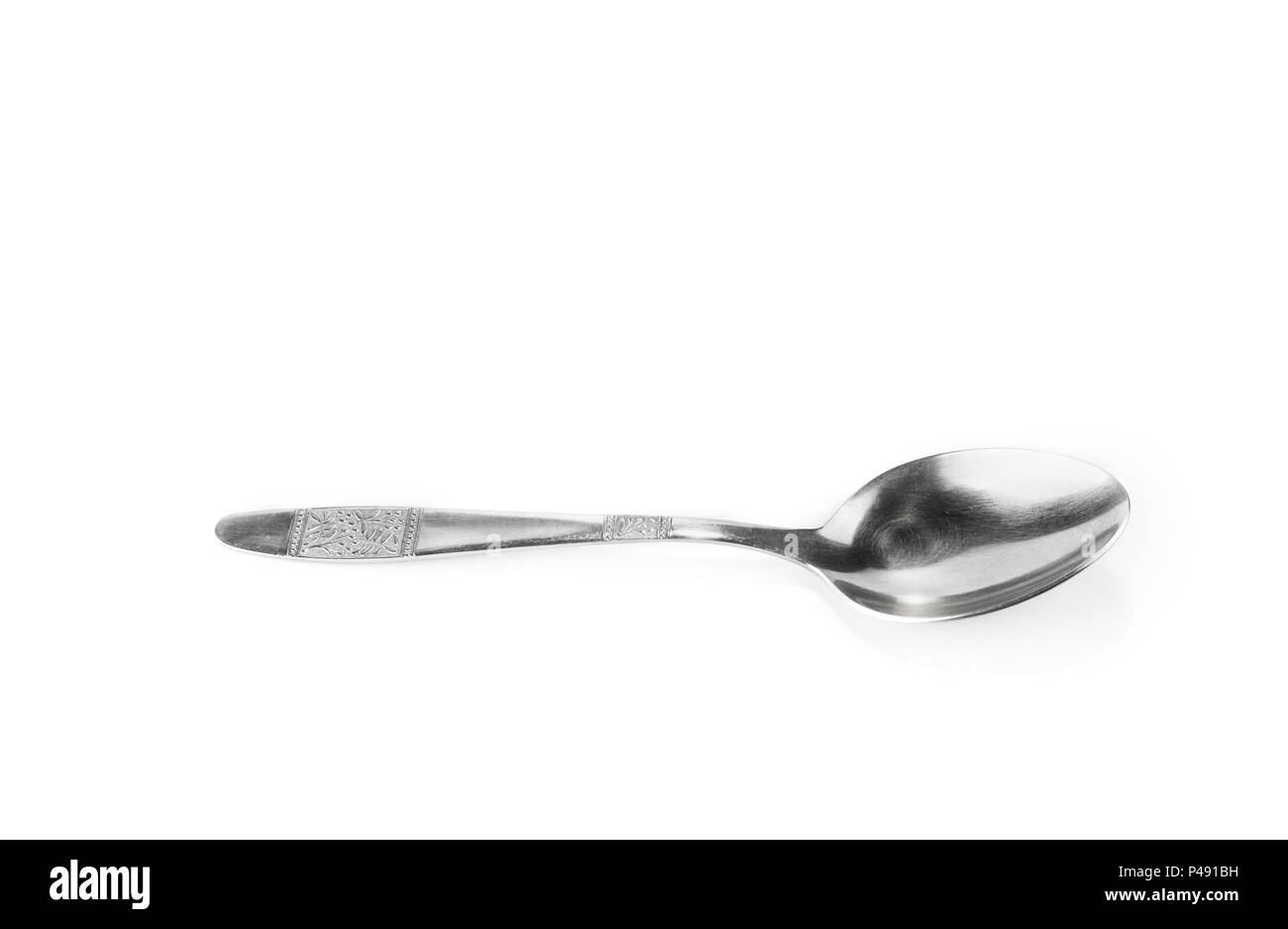 Soup spoon isolated in the white background Stock Photo - Alamy