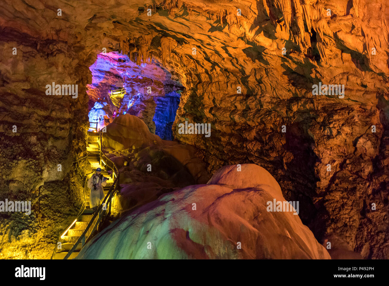 Brightly lit interior of underground cave, Tian Zhong Cave, Libo ...