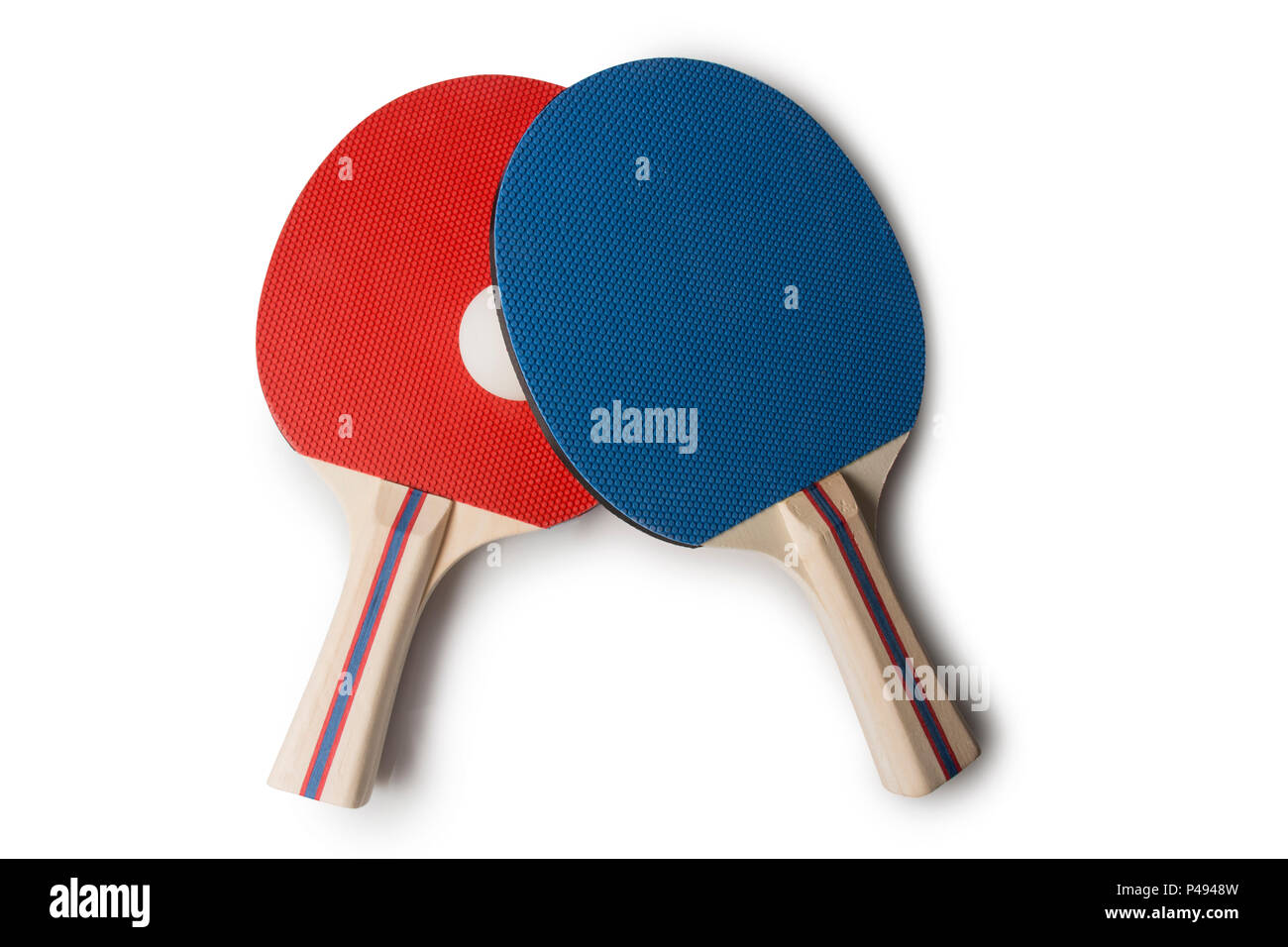 Red and Blue Ping Pong Paddles on white with shadows, Handles Facing ...