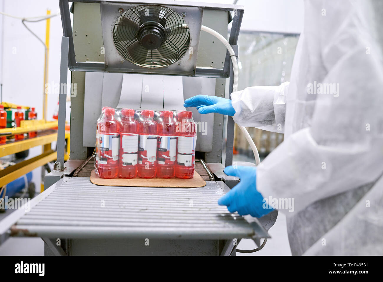 Plastic bottles production hi-res stock photography and images - Alamy
