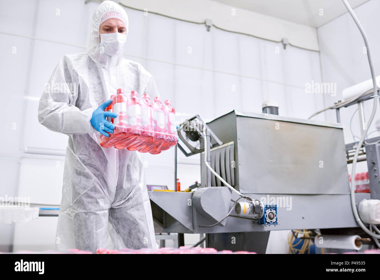 Plastic bottles production hi-res stock photography and images - Alamy