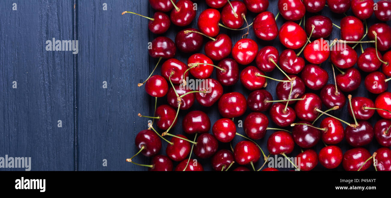 Fresh sweet cherries with stalks large collection of fresh red cherries Stock Photo - Alamy