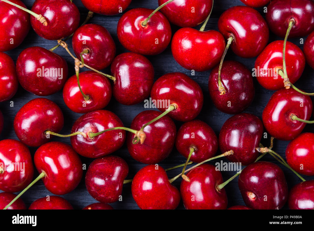 Fresh sweet cherries with stalks large collection of fresh red cherries Stock Photo - Alamy
