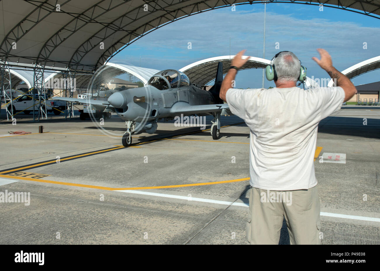 Anthony Hamilton, A-29 Super Tucano crew chief, marshals out U.S. Air ...