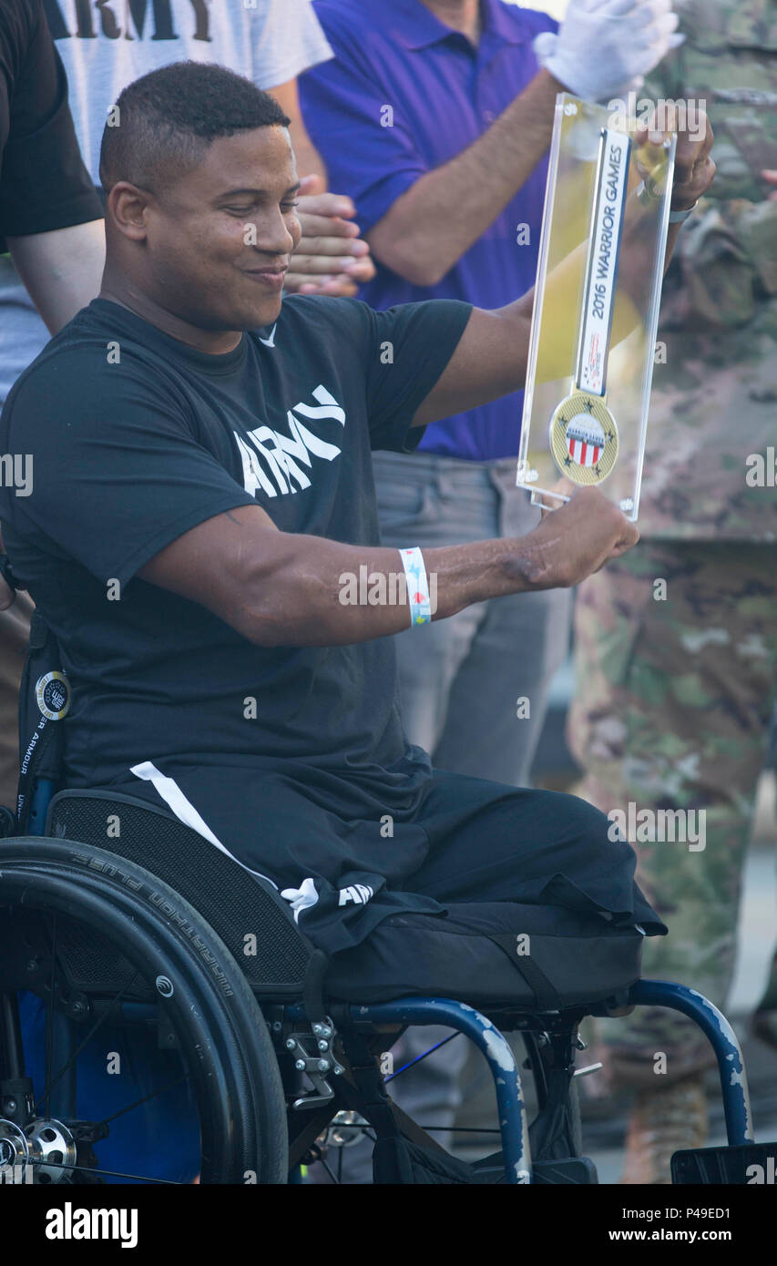 U.S. Army Veteran, Sgt. Ryan Major, of Baltimore, Maryland, is awarded ...