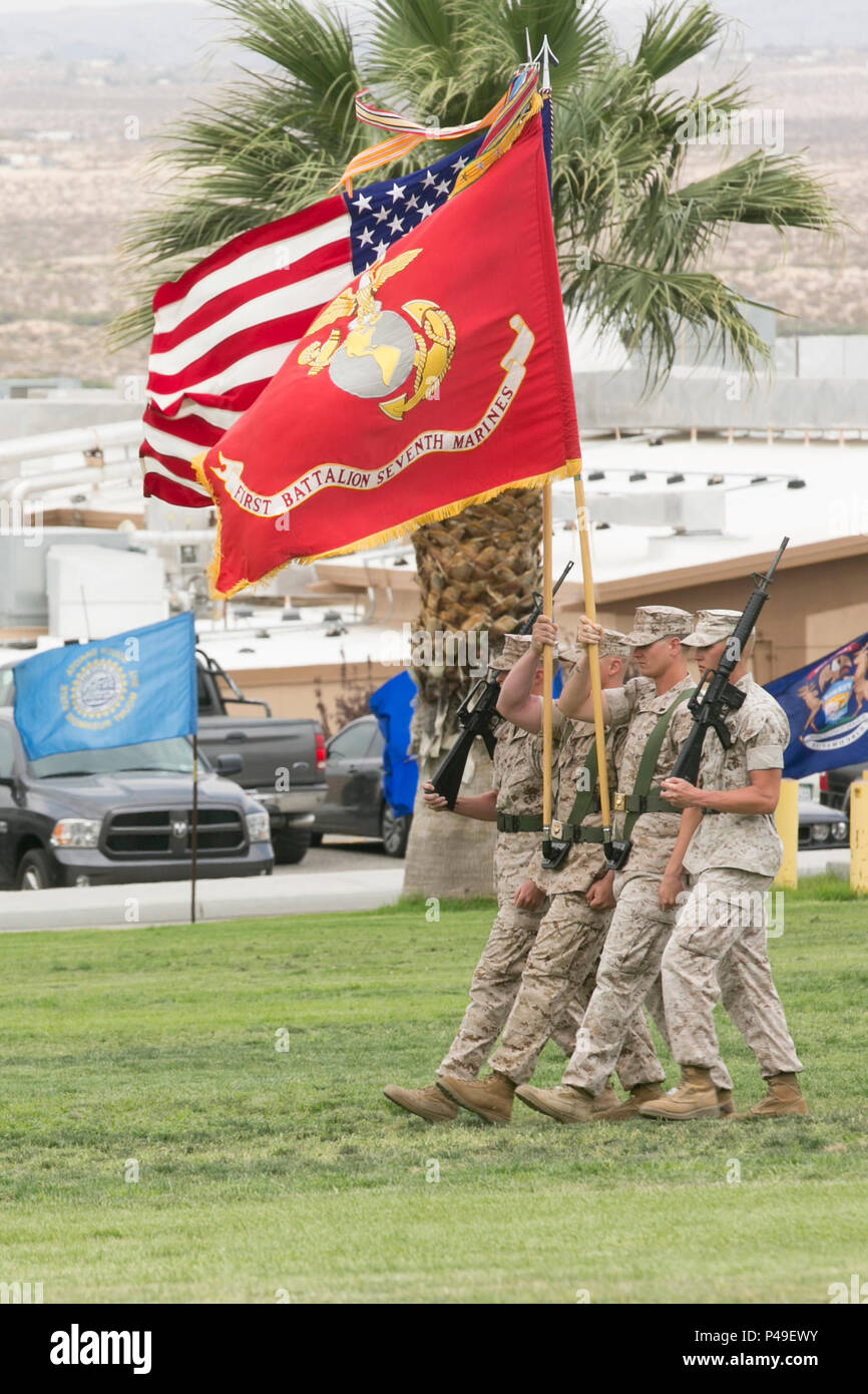 The 1st Battalion, 7th Marine Regiment color guard march with the ...