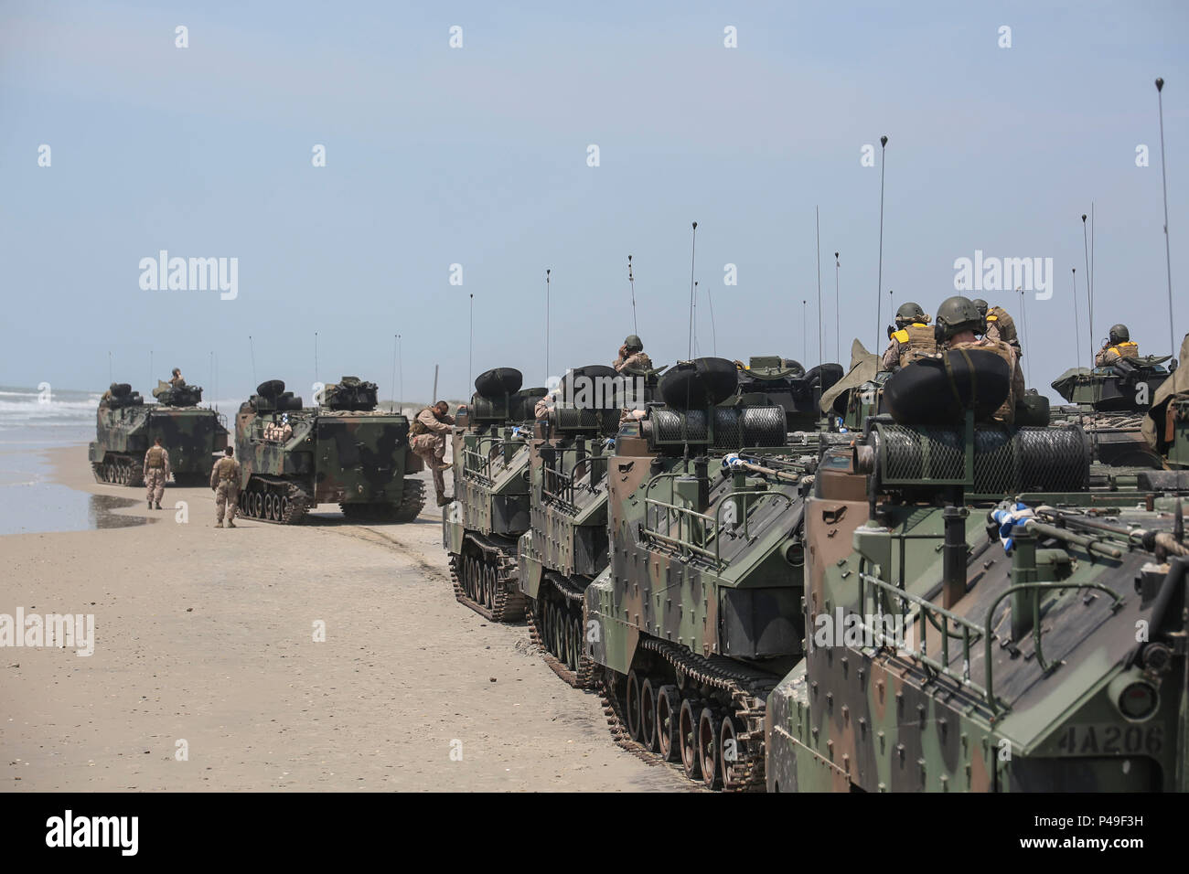 Marines with Charlie Company, 4th Assault Amphibian Battalion move down ...