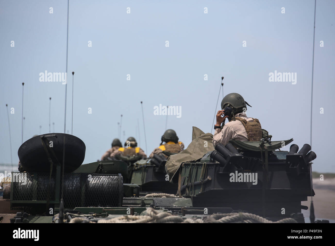 Marines with Charlie Company, 4th Assault Amphibian Battalion move down ...