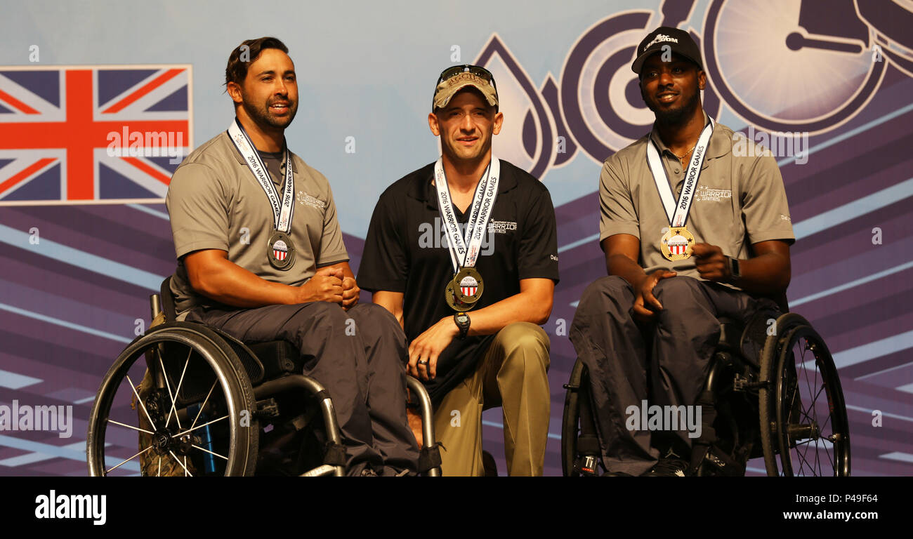 U.S. Army, Capt. Justin Decker (center), of Warrior Transition Unit ...