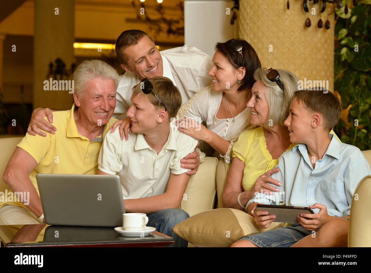 Group family digital devices hi-res stock photography and images - Alamy