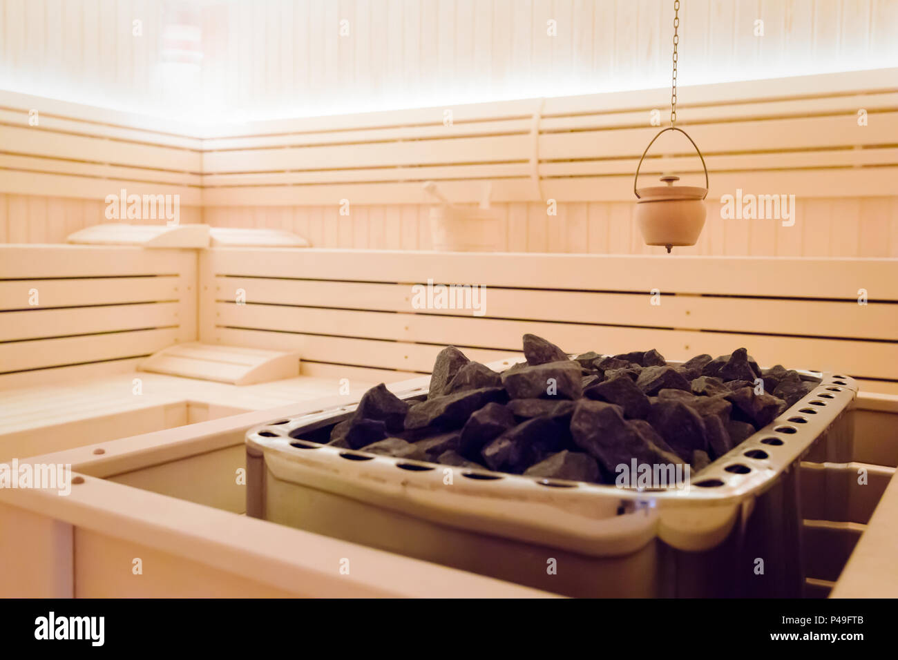 Beautiful sauna interior with stones Stock Photo - Alamy
