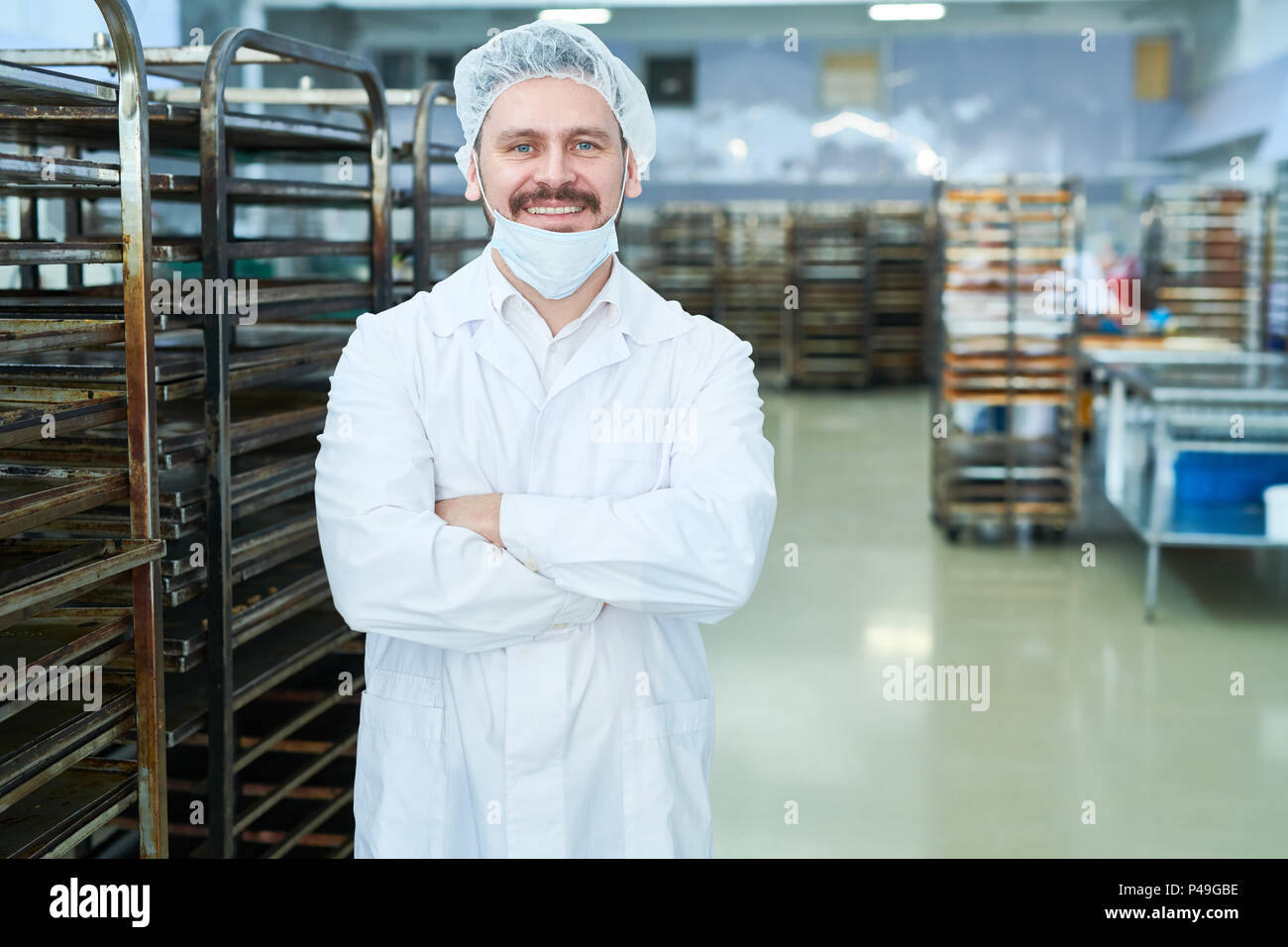 Confectionery factory worker standing hi-res stock photography and ...