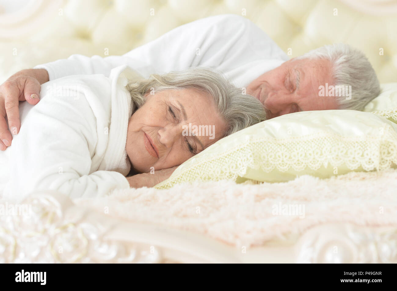 Older couple bed hi-res stock photography and images - Alamy