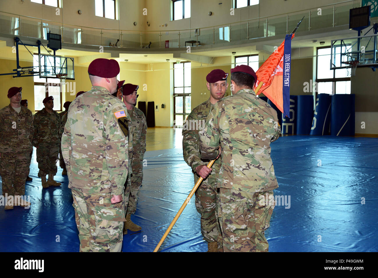 Capt. Marc S. Levitt, center, passes the guidon to Lt. Col. Benjamin A ...