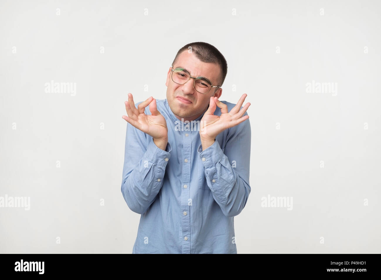 Young caucasian man doing a typical italian gesture, symbol or ...