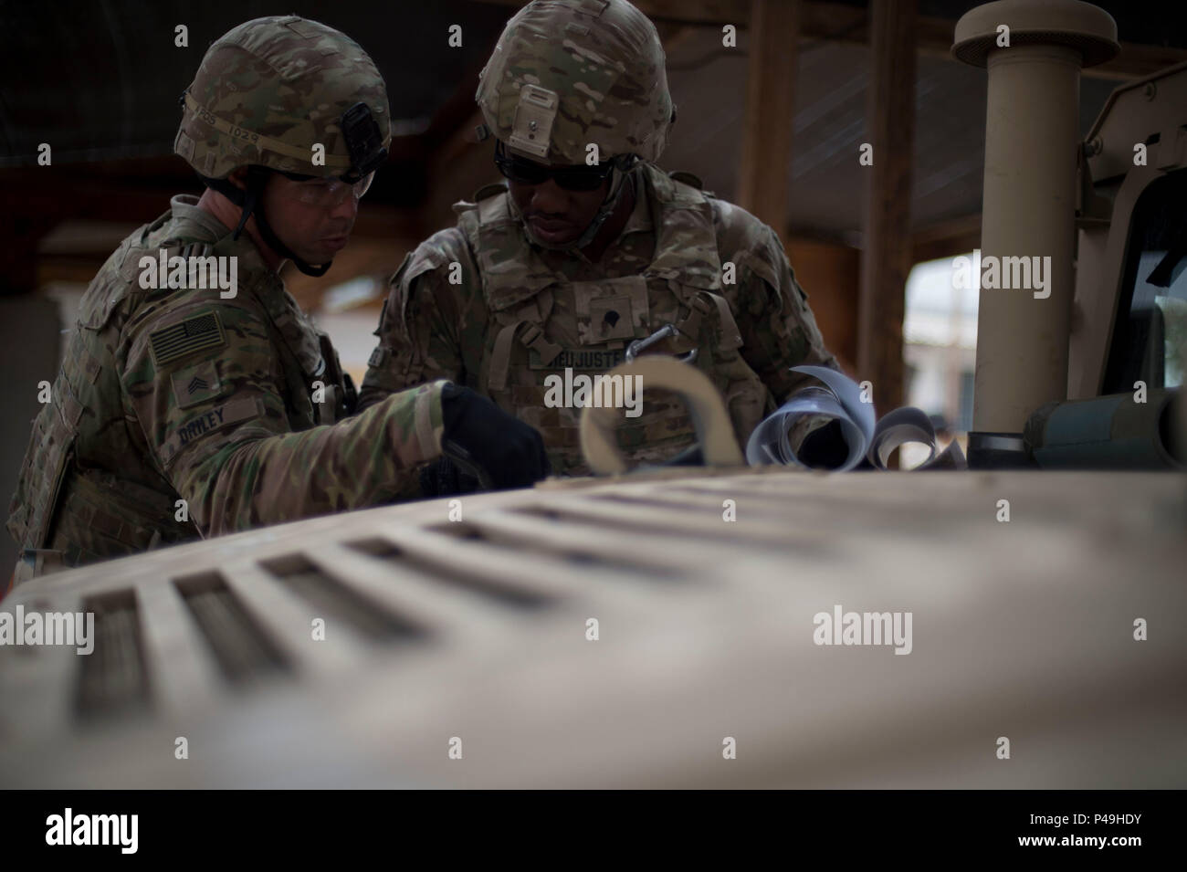 U.S. Army Sgt. Patrick O’Riley and Spc. Vital Dieujuste, Combined Joint ...