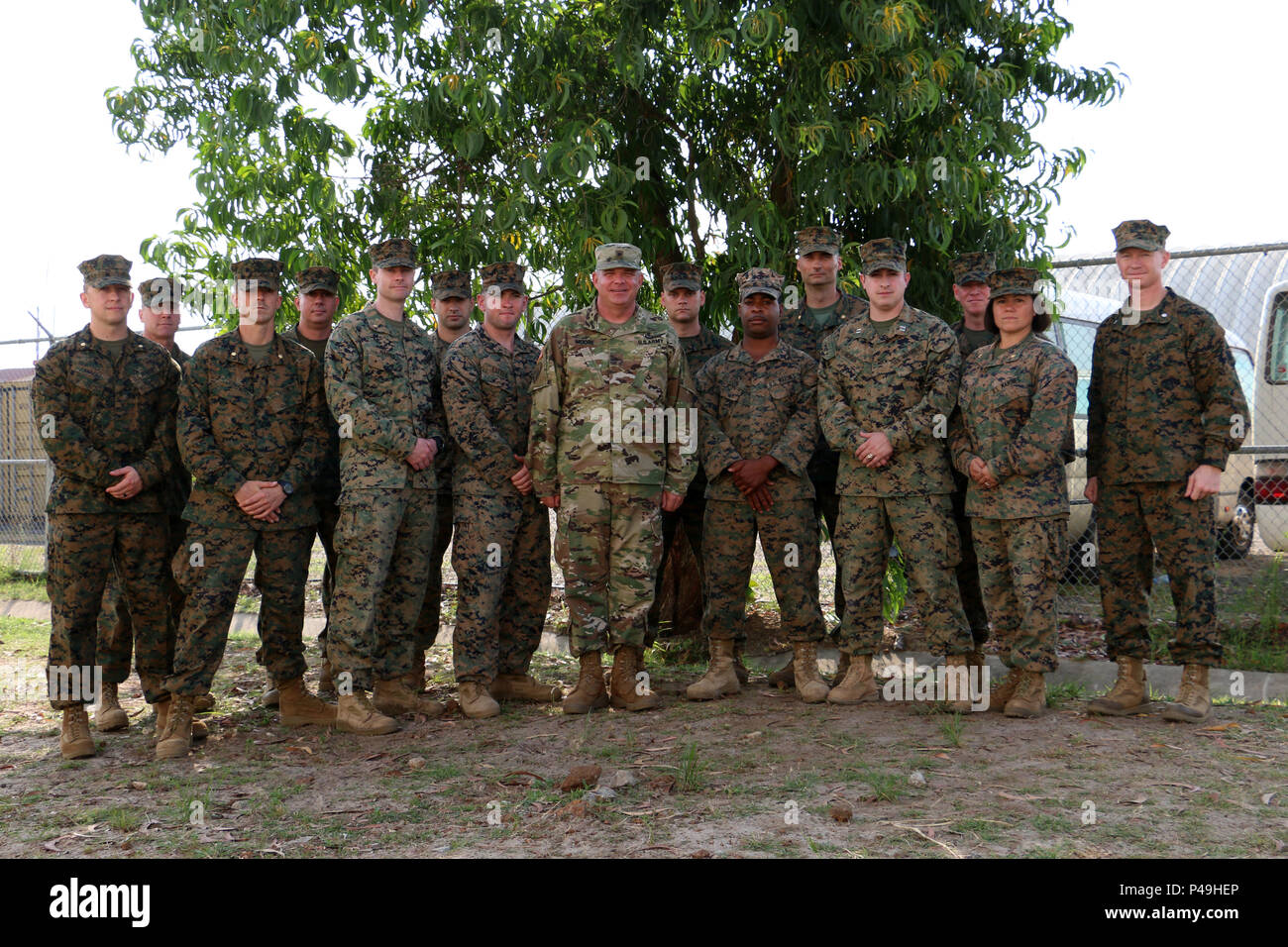 U.S. Army Brig. Gen. Kenneth H. Moore (center), deputy commander of U.S ...