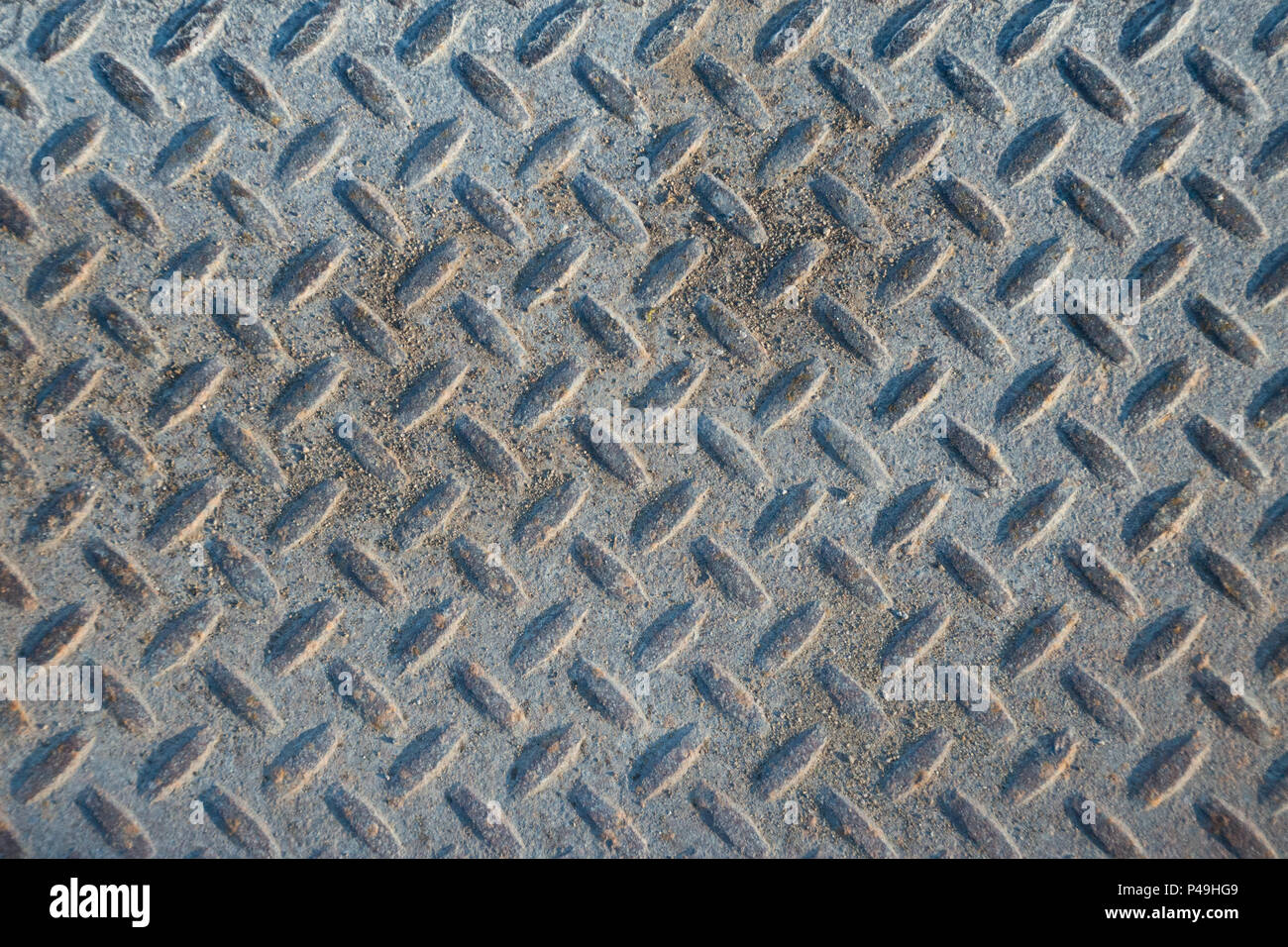 Closeup landscape of a distressed, mottled, gungy industrial ...