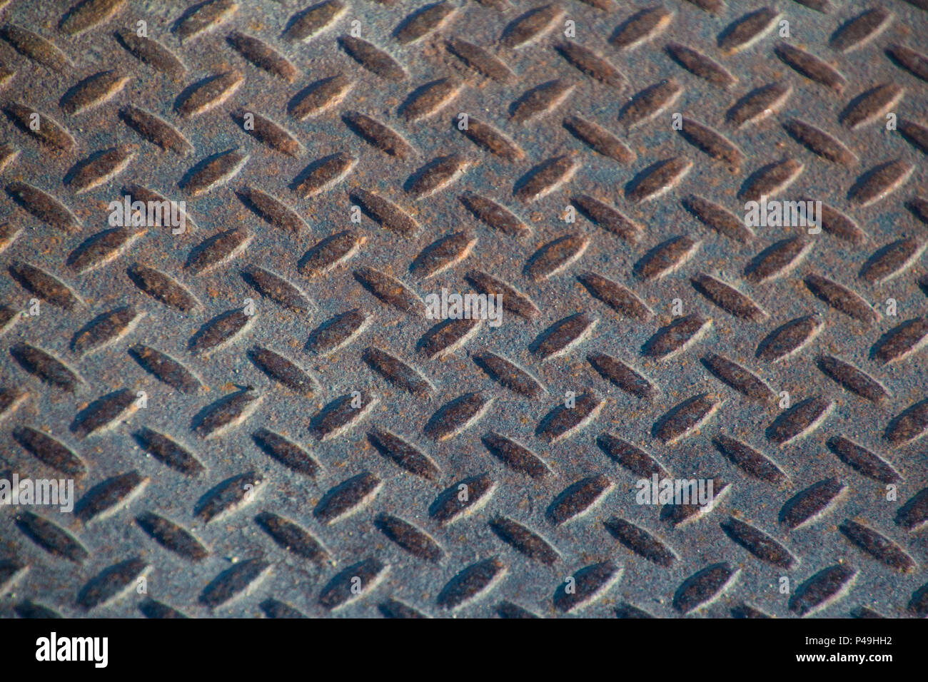 Closeup landscape of a distressed, mottled, gungy industrial ...