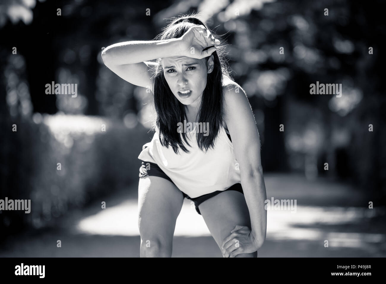 Exhausted sweaty female jogger hi-res stock photography and images - Alamy